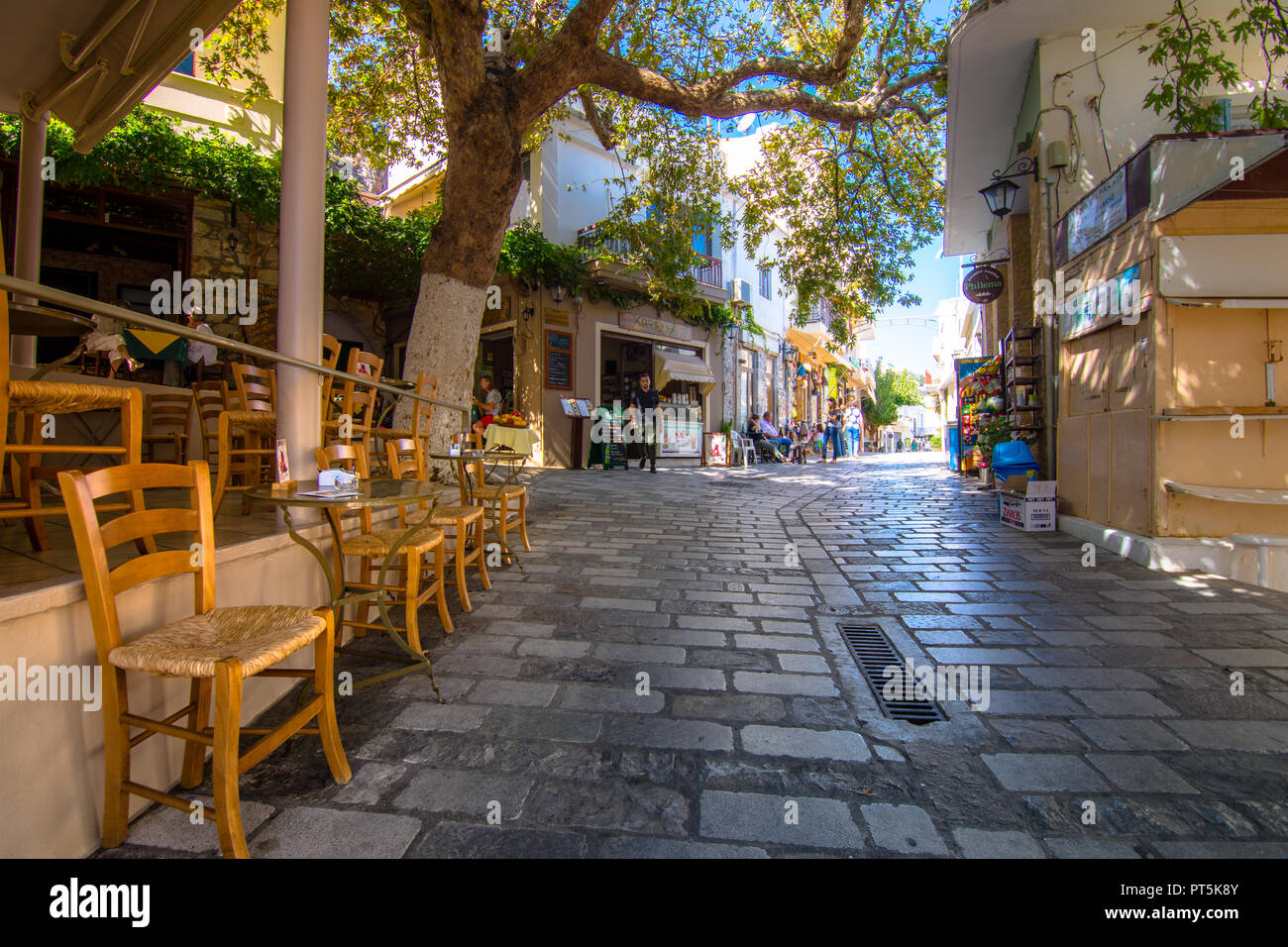 Narrow street in the old village of Kritsa, Crete, Greece Stock Photo ...