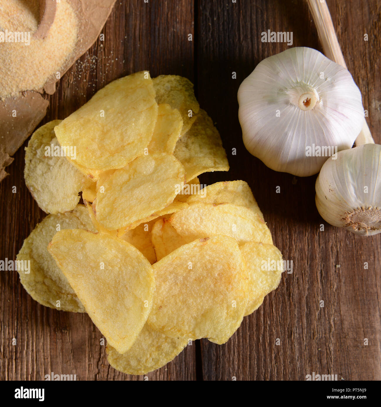 Potato chips- garlic flavour Stock Photo - Alamy