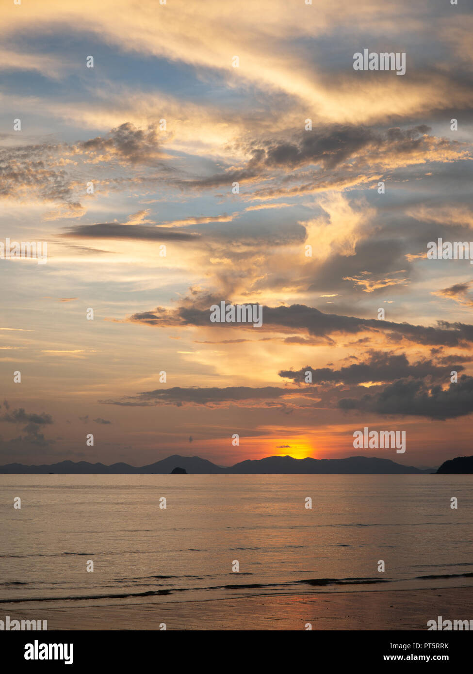 Amazing Sunset at the tropical beach Stock Photo - Alamy