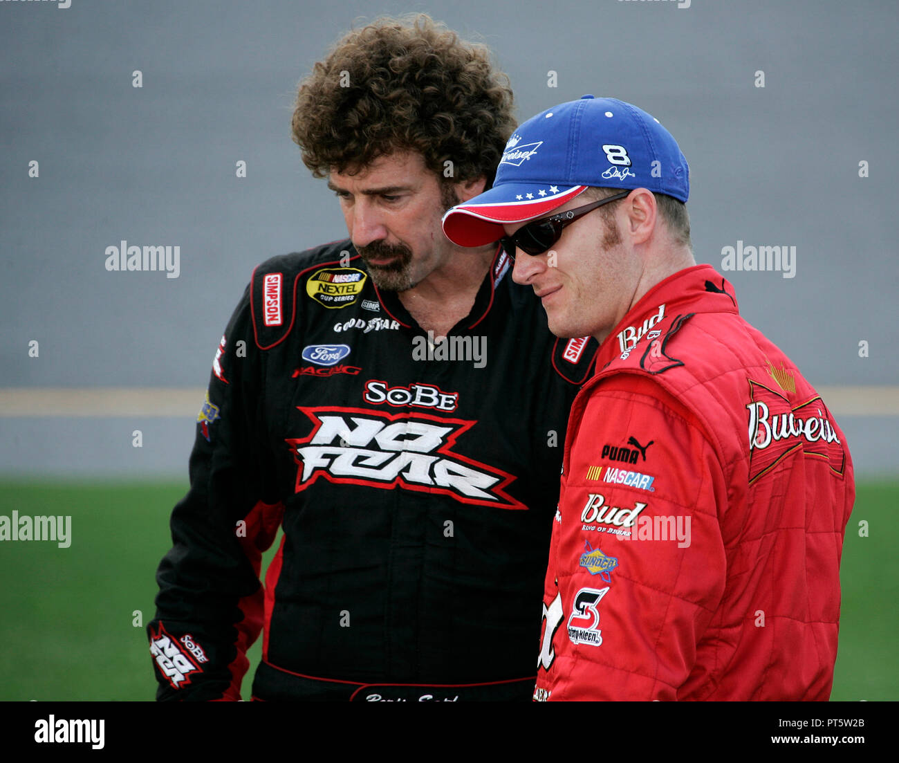 Dale Earnhardt Jr. (L) talks to Boris Said on pit row prior to their ...