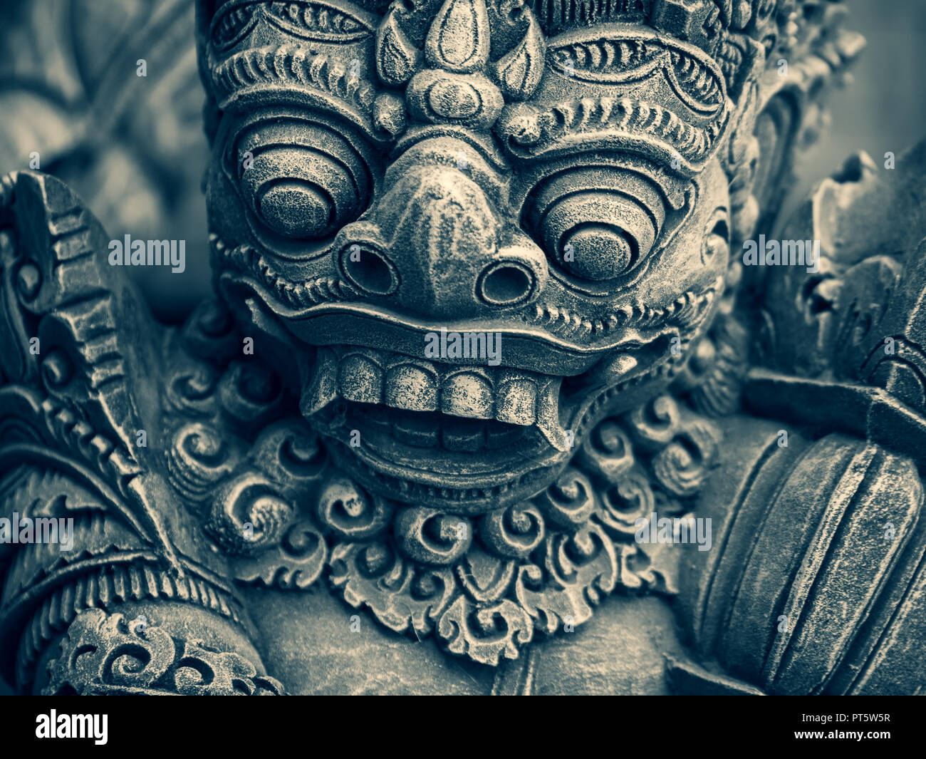 Traditional stone statues depicting demons, gods and Balinese ...