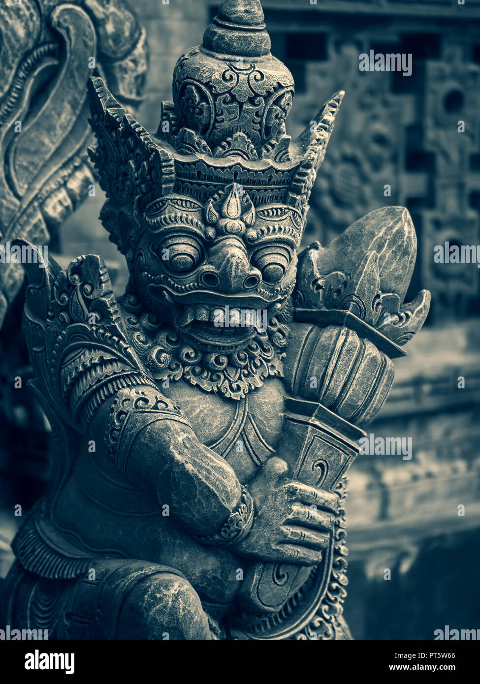 Traditional stone statues depicting demons, gods and Balinese ...