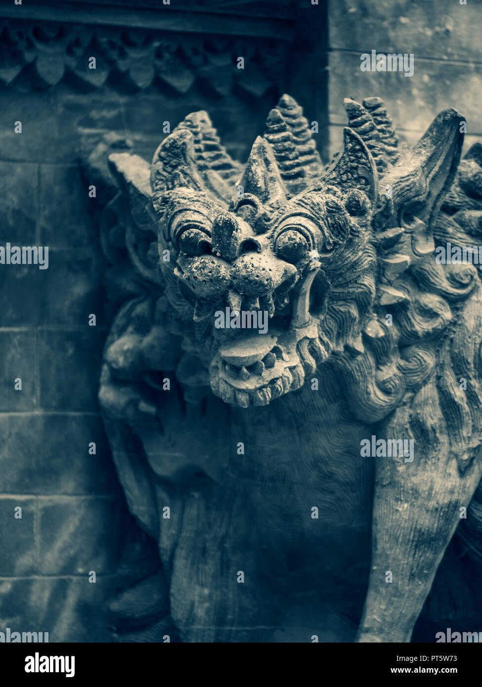 Traditional stone statues depicting demons, gods and Balinese ...