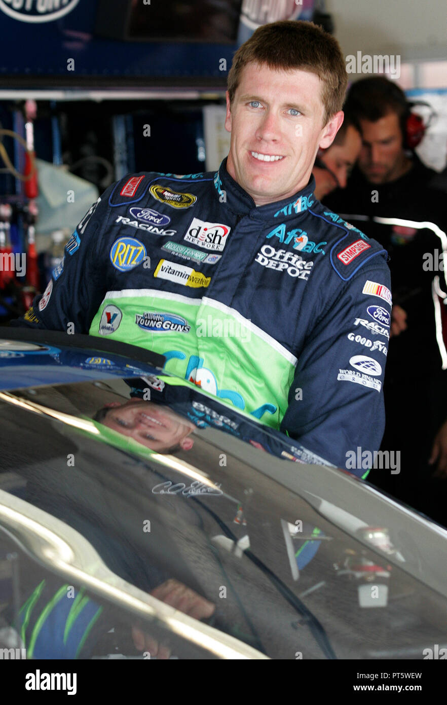 Carl Edwards climbs in his car prior to the NASCAR Sprint Cup Coke Zero ...