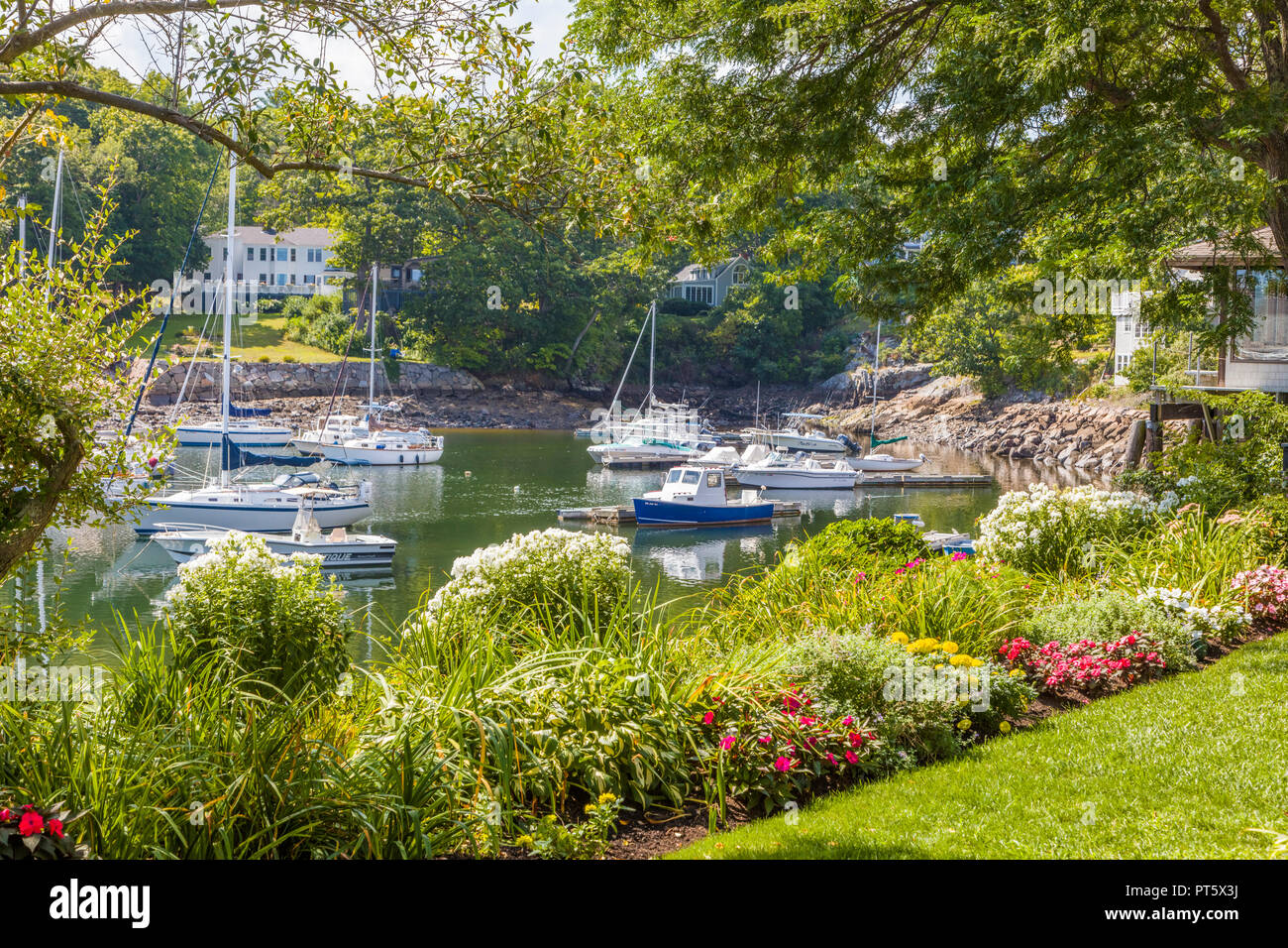 Boats in harbor at Perkins Cove in Ogunquit Maine in the United States ...