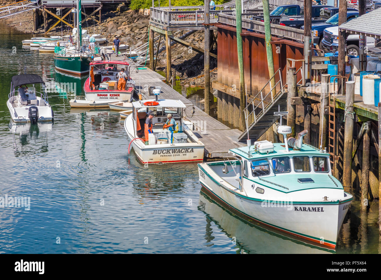 Boats in harbor at Perkins Cove in Ogunquit Maine in the United States ...
