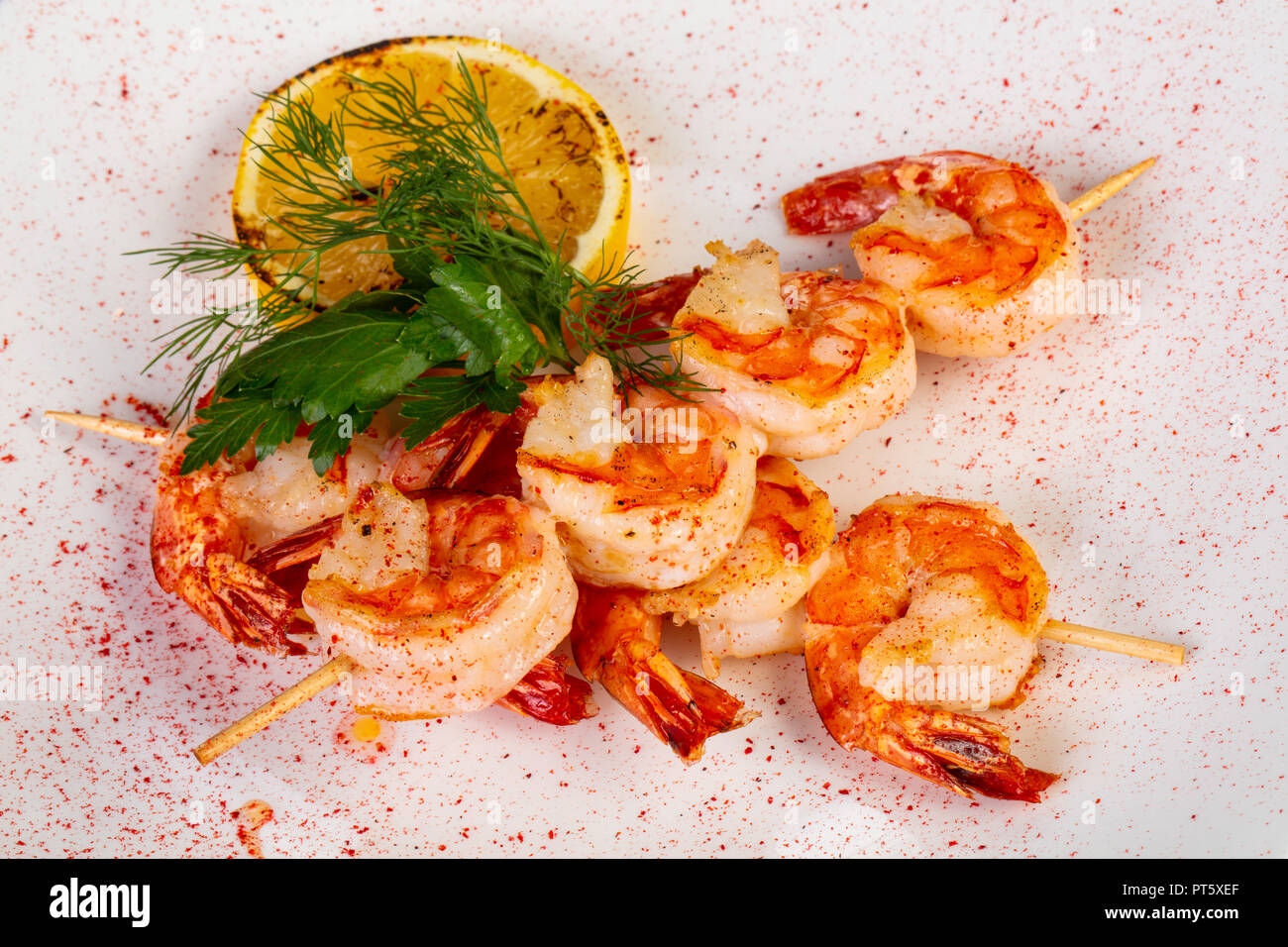 Tasty tiger prawn with garlic sauce Stock Photo - Alamy