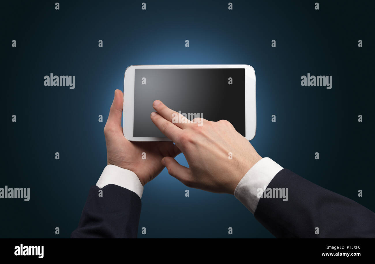 Hand using tablet with no concept and empty space Stock Photo - Alamy