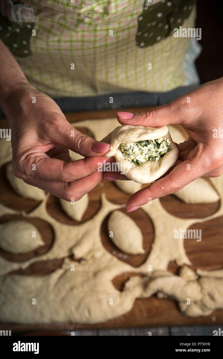 women's hands making pies Stock Photo - Alamy