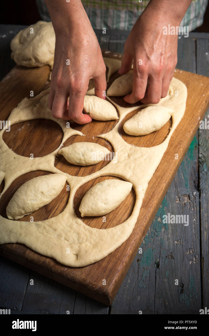 pies in hand Stock Photo - Alamy