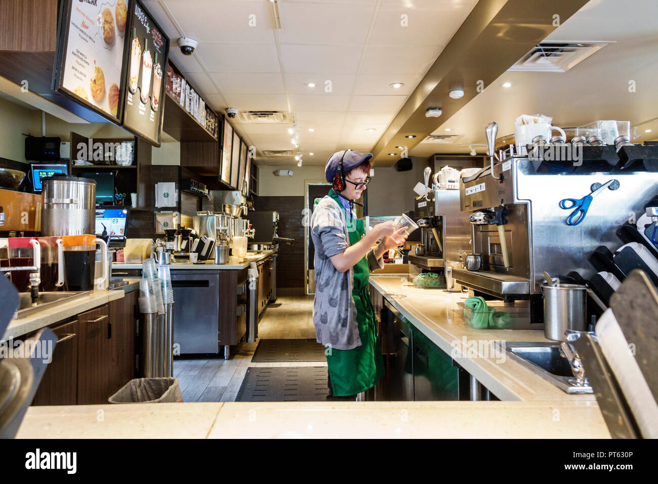 People working inside starbucks cafe hi-res stock photography and ...