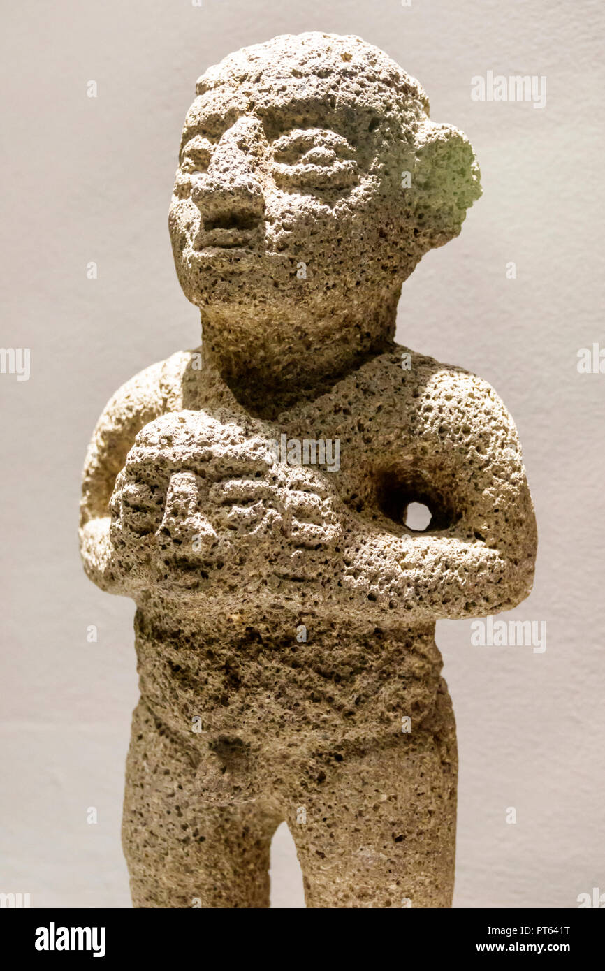 Warrior figure holding mace trophy head hi-res stock photography and ...