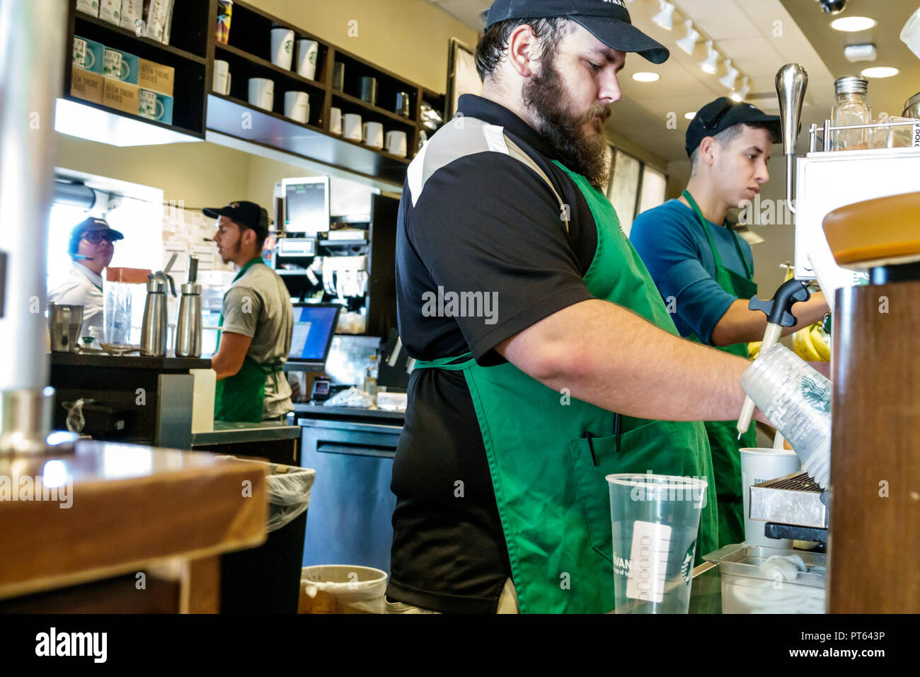 Man Working Behind Counter In Stock Photos & Man Working Behind Counter ...