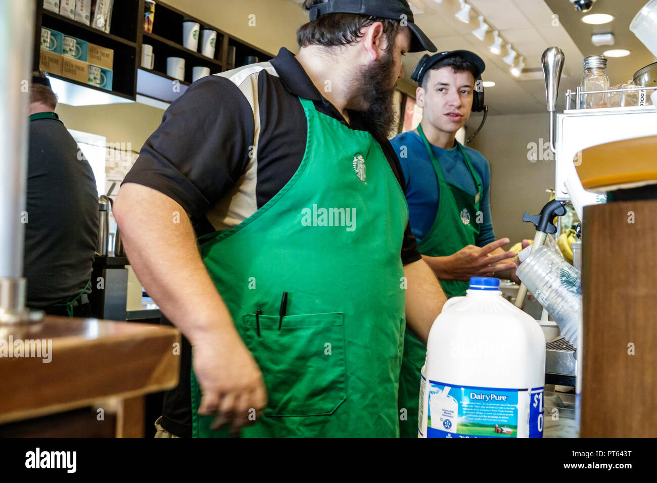 Man Working Behind Counter In Stock Photos & Man Working Behind Counter ...