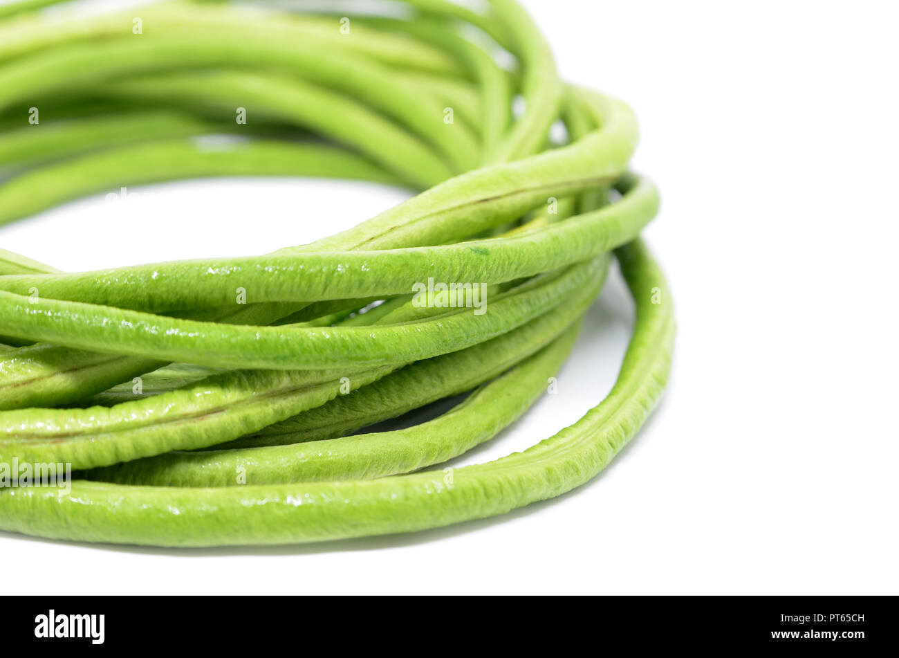 Bunch of fresh long bean isolated Stock Photo - Alamy
