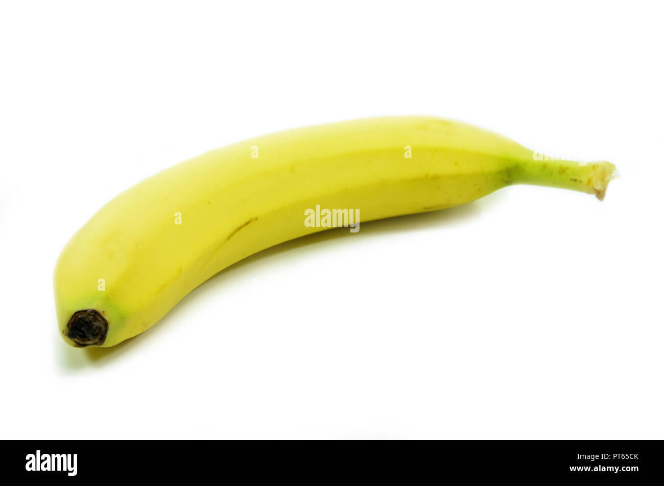 Single ripe banana isolated on white background Stock Photo - Alamy