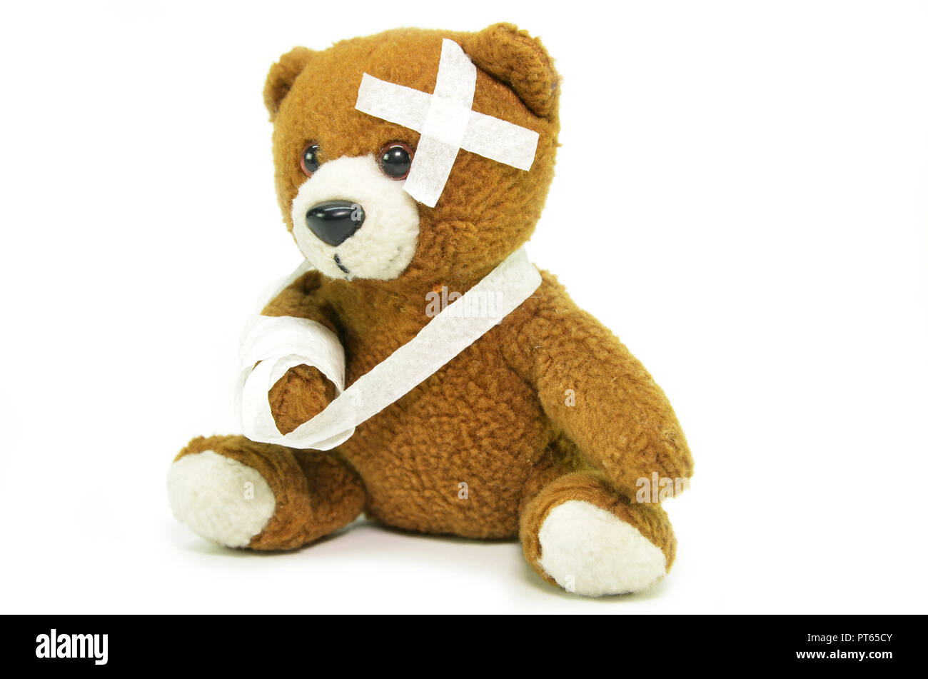 Injured teddy bear with bandages on white background Stock Photo - Alamy