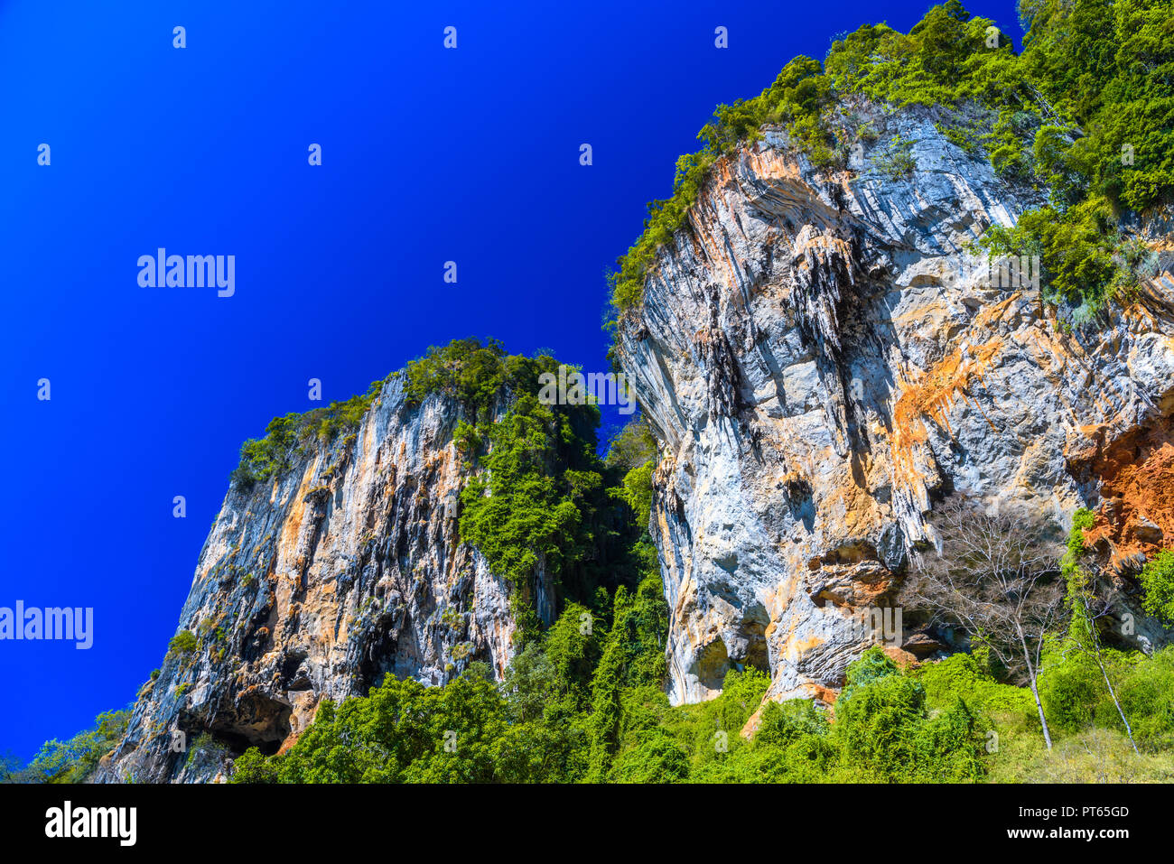 Rock cliff with blue sky, Tonsai Bay, Railay Beach, Ao Nang, Krabi ...