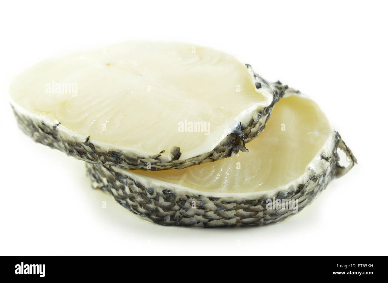 Pieces of raw cod fish fillets on white background Stock Photo - Alamy