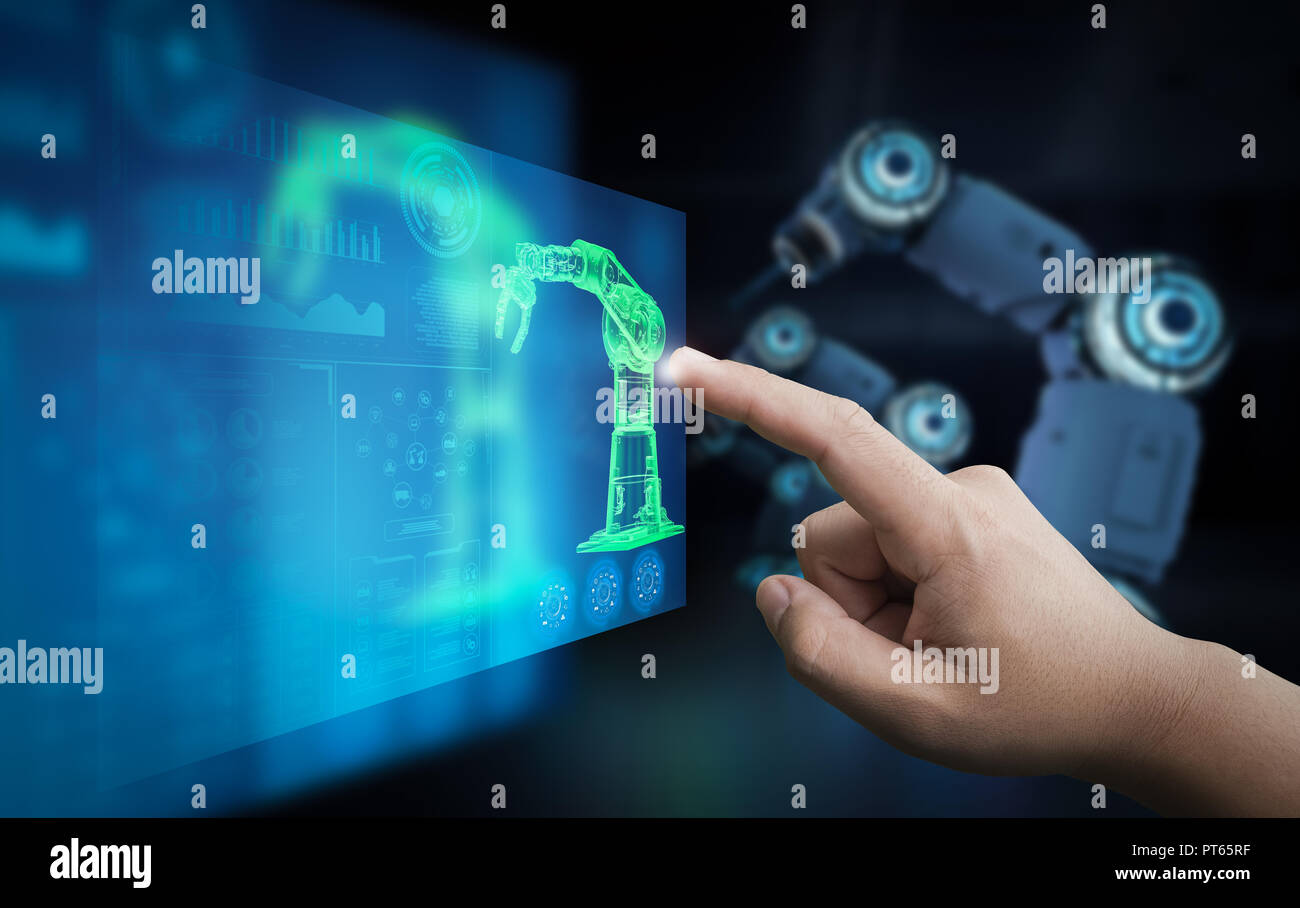 Technician control 3d rendering robot arm in factory Stock Photo - Alamy