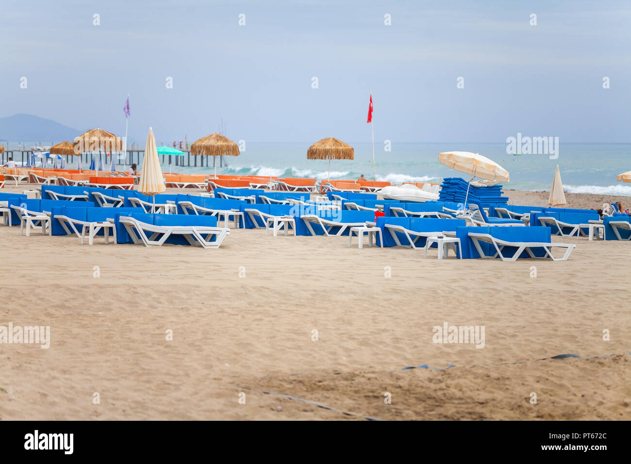 Beach chairs stands on the coast of Antalya / Turkey Stock Photo - Alamy