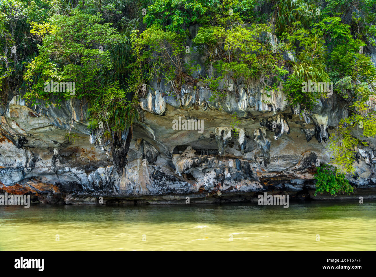 Rocks cliffs near the water, Ko Pan Yi, Ao Phang-nga National Park ...