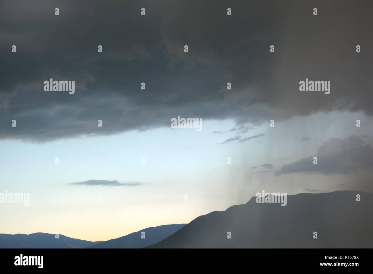 Rain curtain in the sky Stock Photo - Alamy