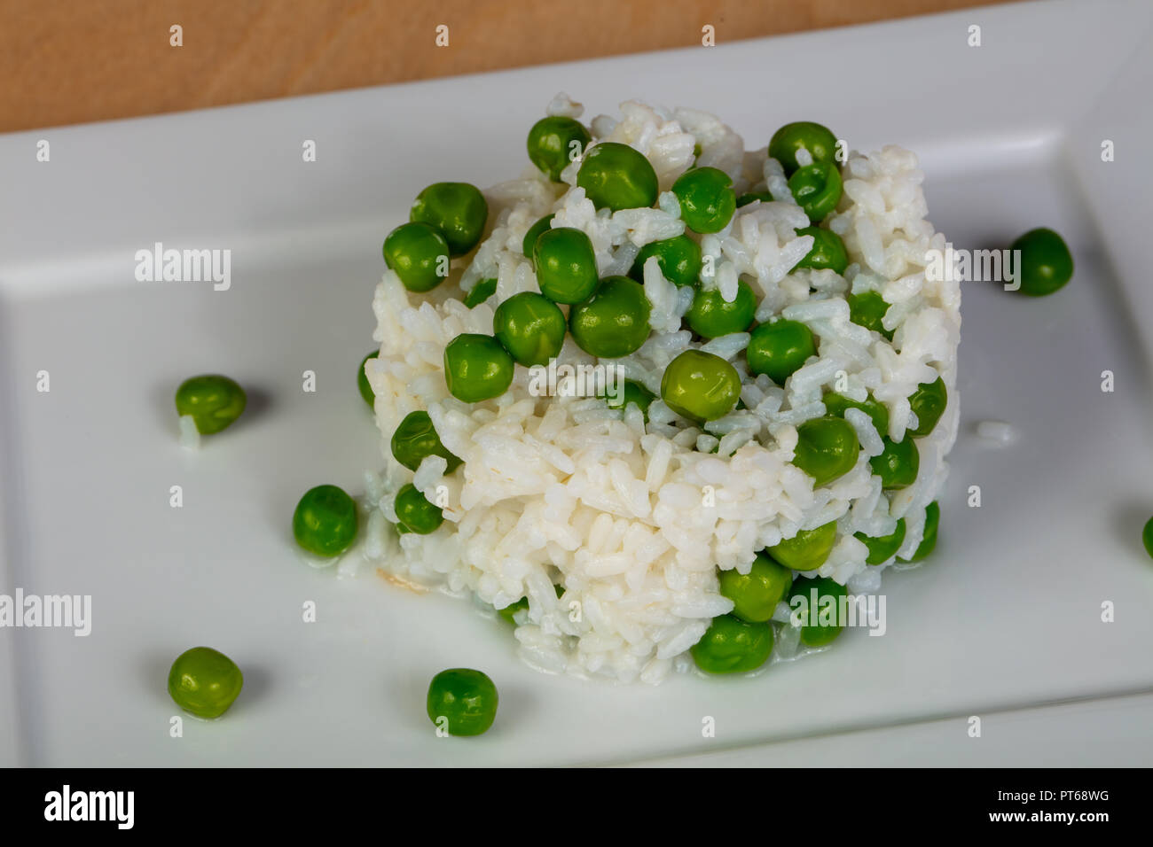Steamed rice with green peas in the plate Stock Photo - Alamy