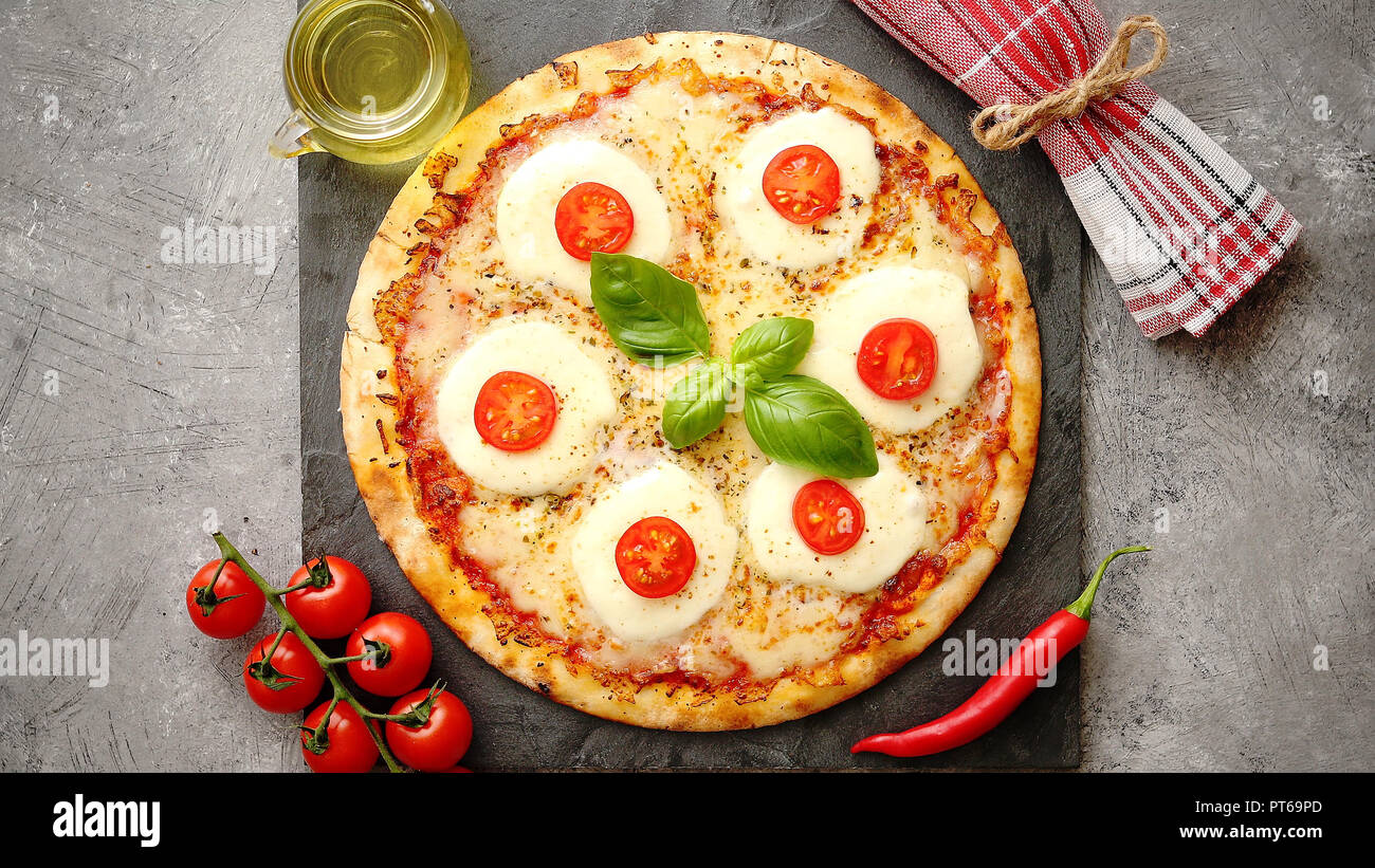 Homemade pizza with tomatoes, mozzarella Stock Photo - Alamy