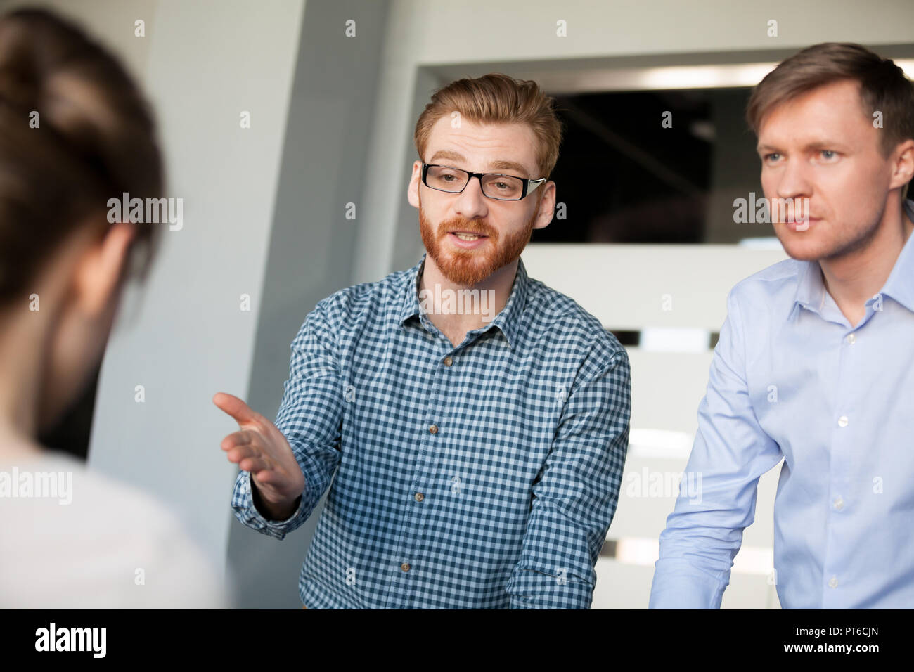 Businessman talking at group meeting, hr asking questions at int Stock ...