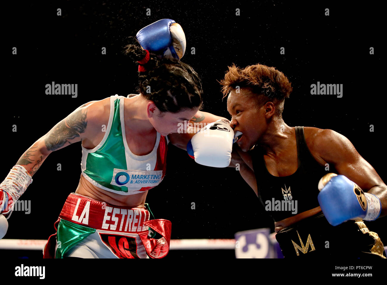 Nicola Adams (right) and Isabel Millan (right) in action during the WBO ...