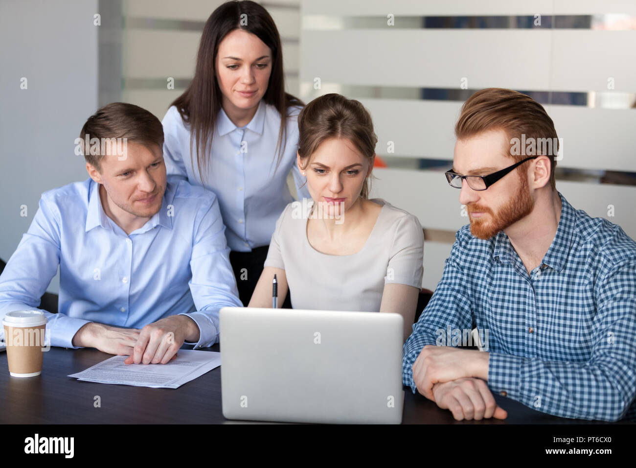 Business team discussing online marketing strategy working on la Stock ...