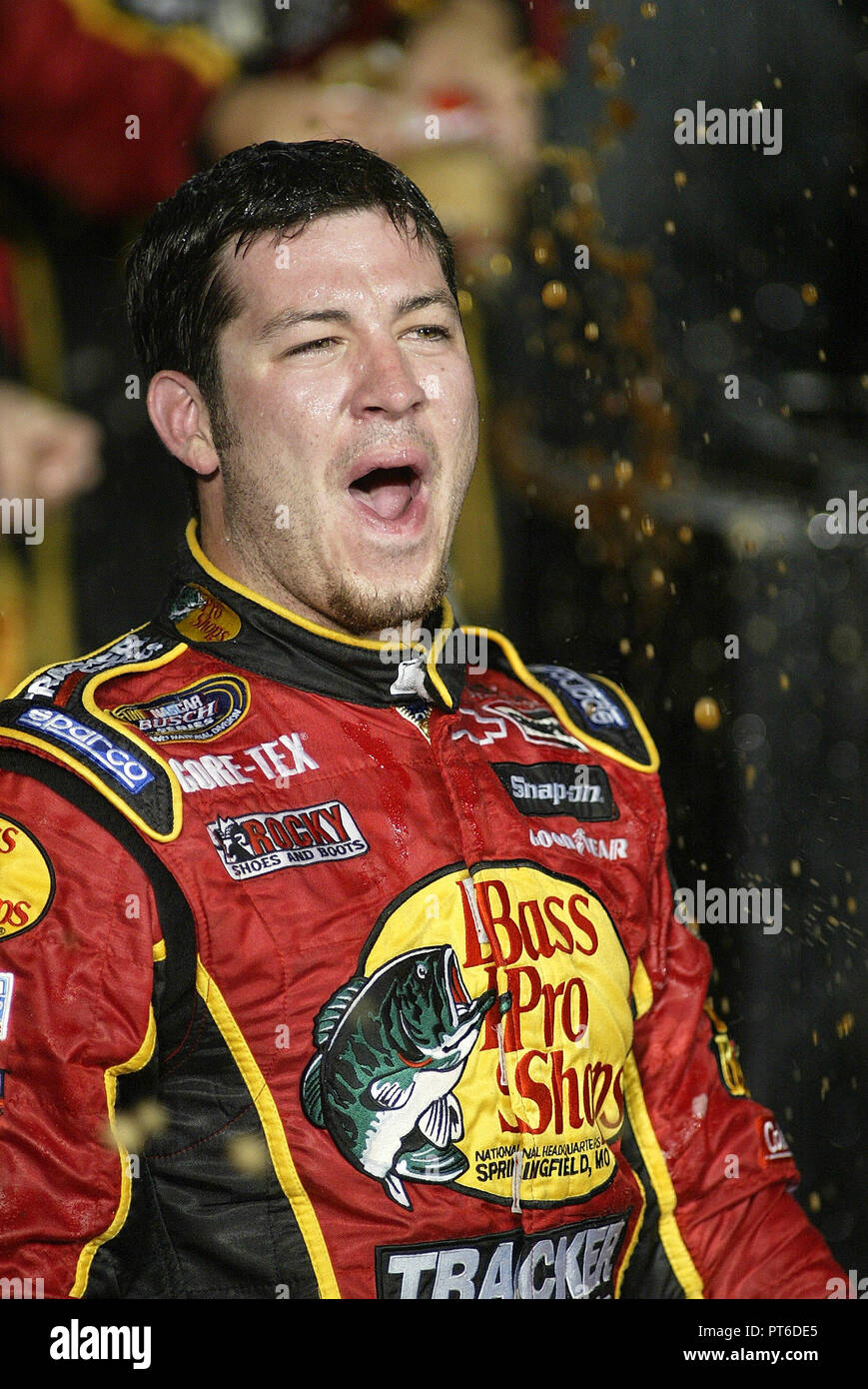 Martin Truex Jr celebrates winning the NASCAR Busch series championship ...