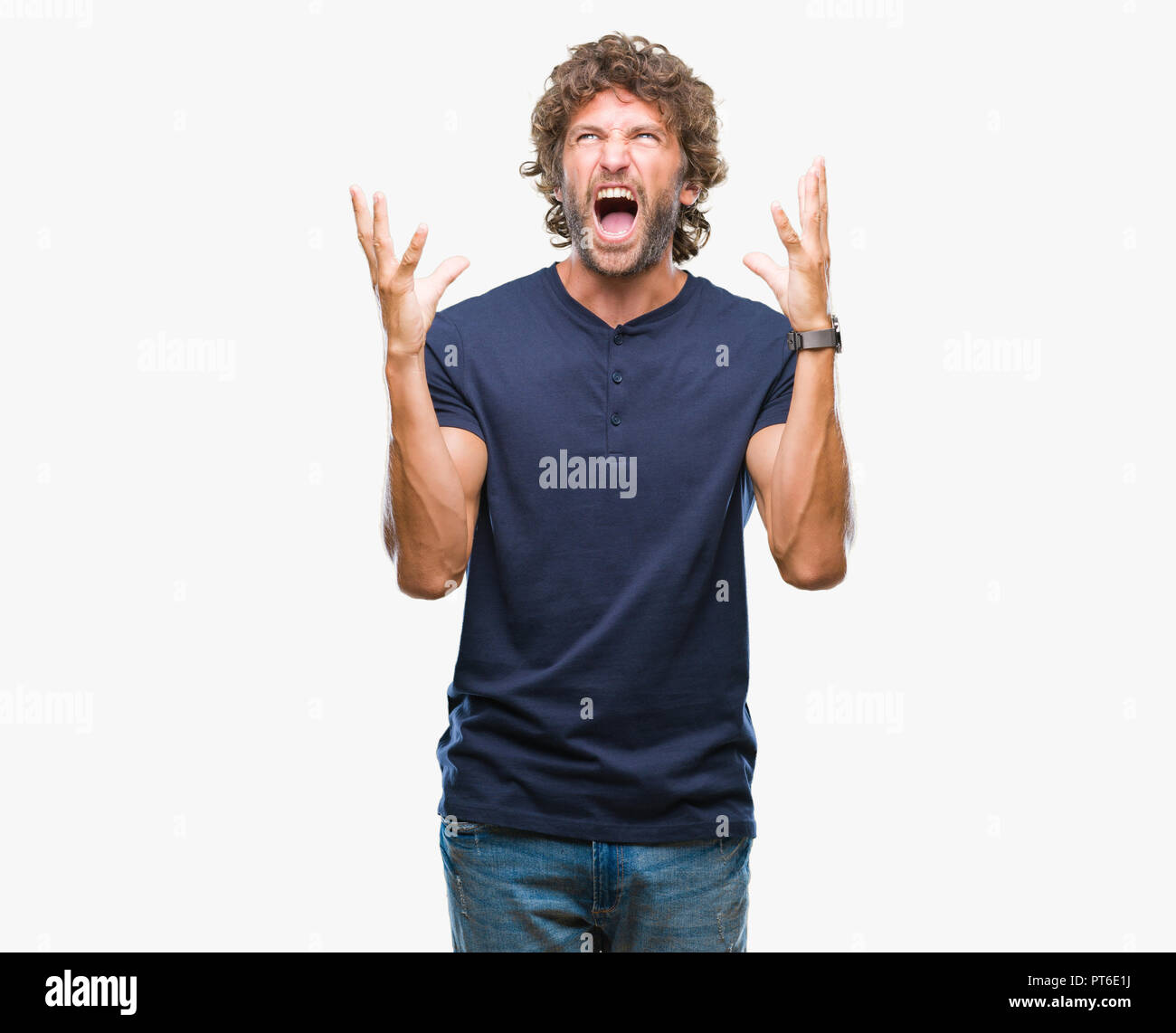 Handsome hispanic model man over isolated background crazy and mad ...