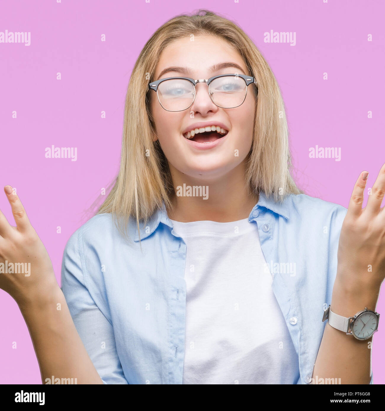 Young caucasian business woman wearing glasses over isolated background ...