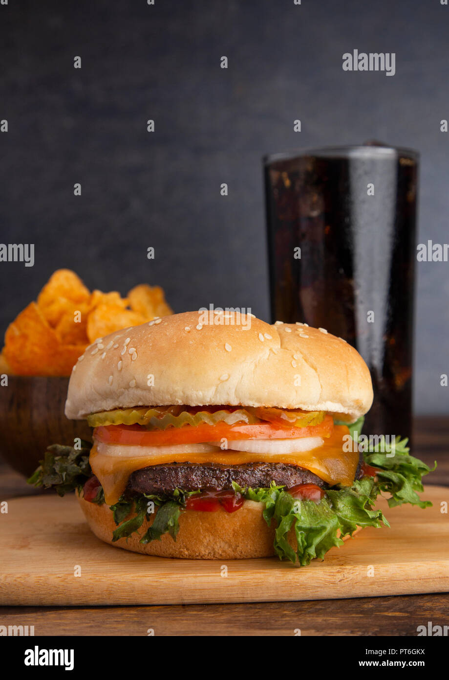 A Perfect Beef Hamburger with All the Fixings with an Ice Cold Soda ...