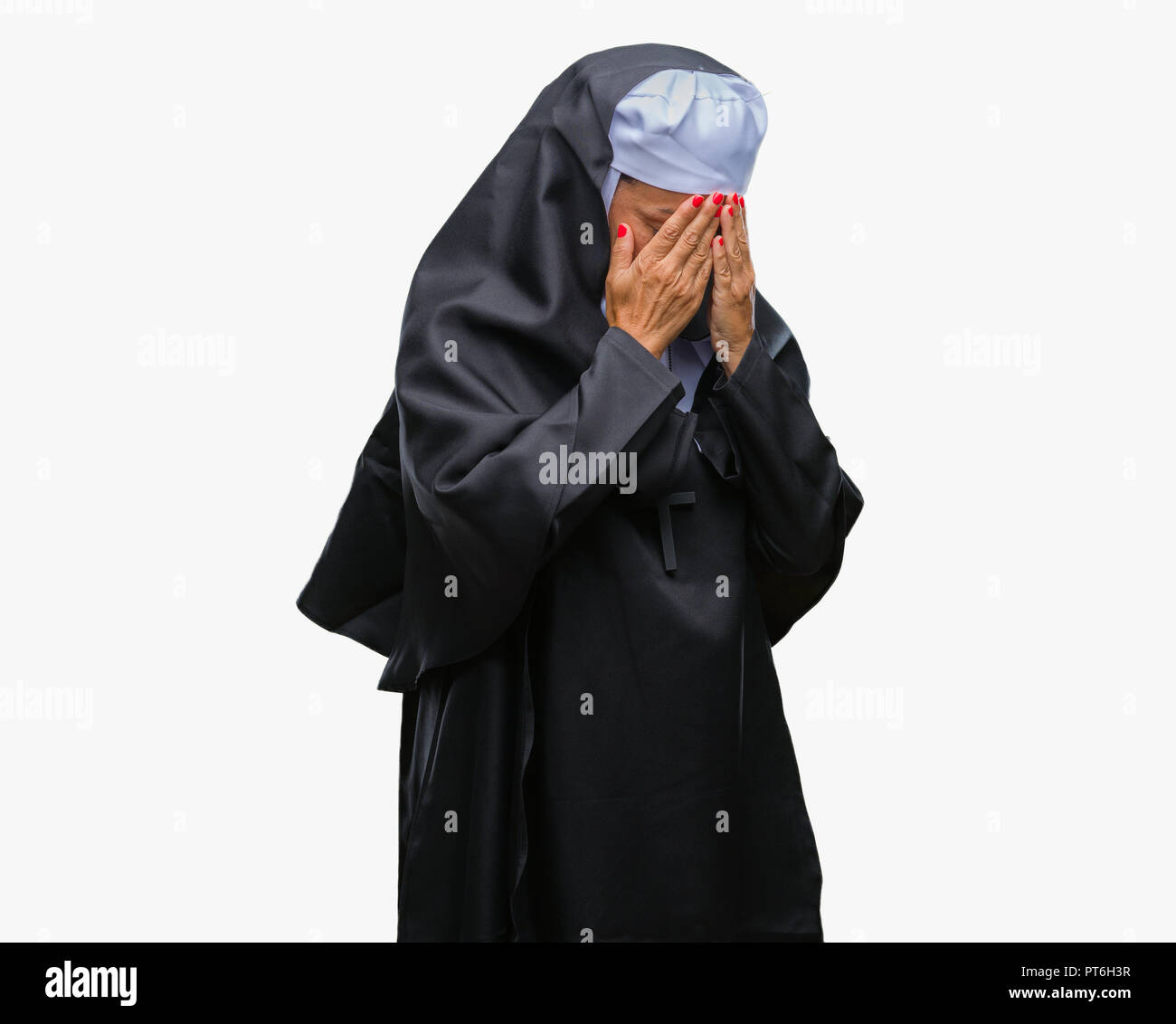 Middle Age Senior Christian Catholic Nun Woman Over Isolated Background With Sad Expression