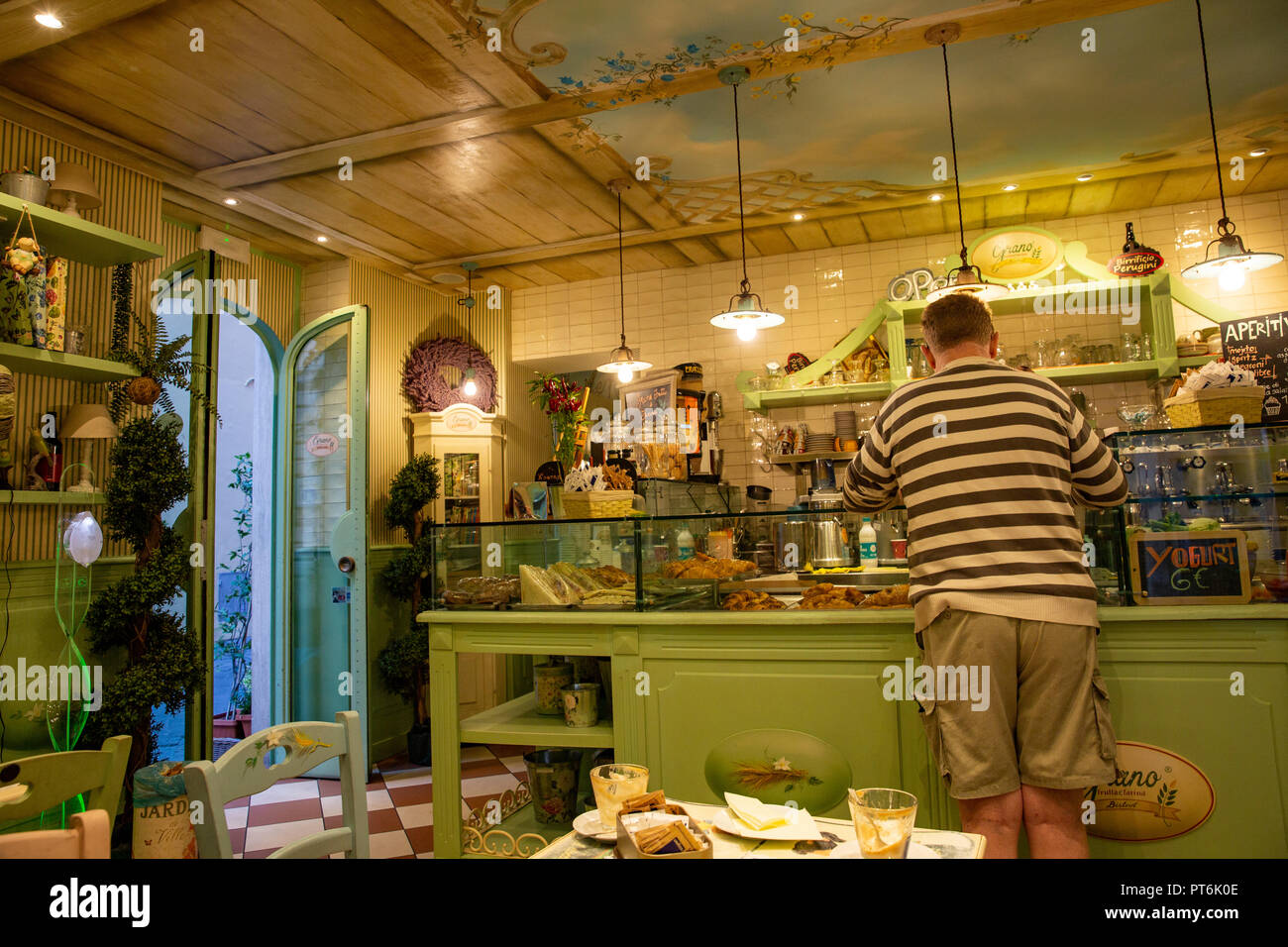 Deli shop counter bread man hi-res stock photography and images - Alamy