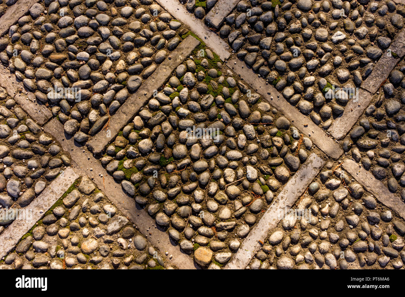 Italy, Bellagio, Lake Como, square cobble stone pattern Stock Photo - Alamy