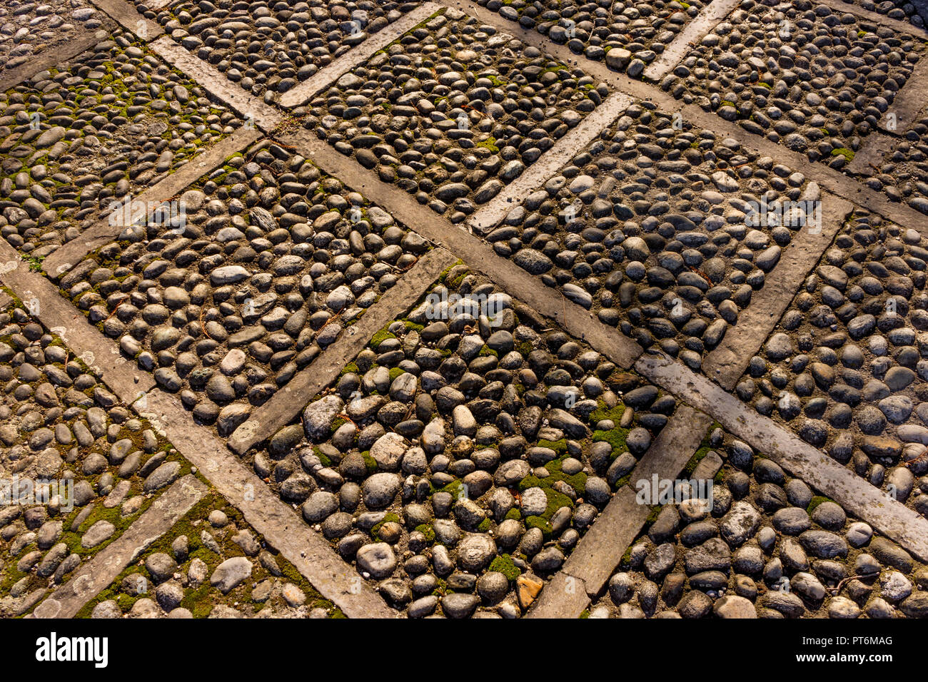 Italy, Bellagio, Lake Como, square cobble stone pattern Stock Photo - Alamy