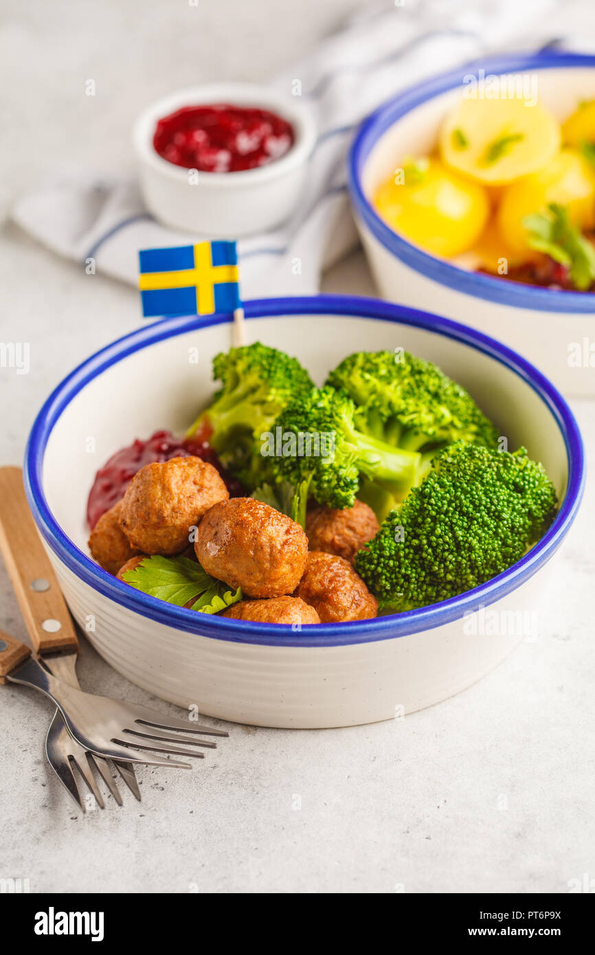 Swedish traditional meatballs with broccoli, boiled potatoes and ...
