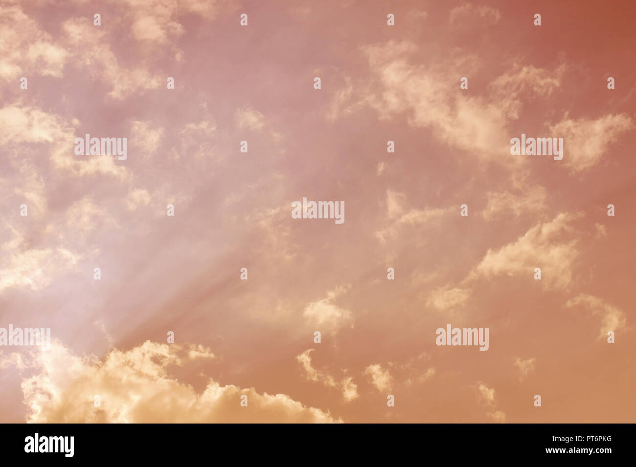 Nature background. Fluffy soft clouds in sky toned Stock Photo - Alamy