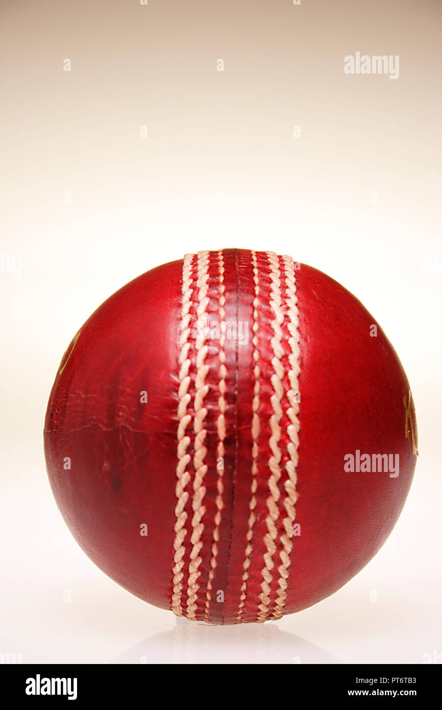 A STILL LIFE OF CRICKET BALLS ON A PLAIN BACKGROUND Stock Photo - Alamy