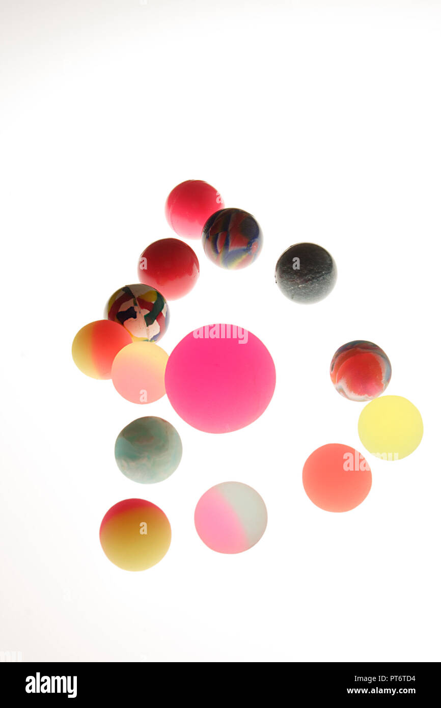 STILL LIFE OF ASSORTED BALLS OF ON A PLAIN BACKLIT BACKGROUND Stock ...