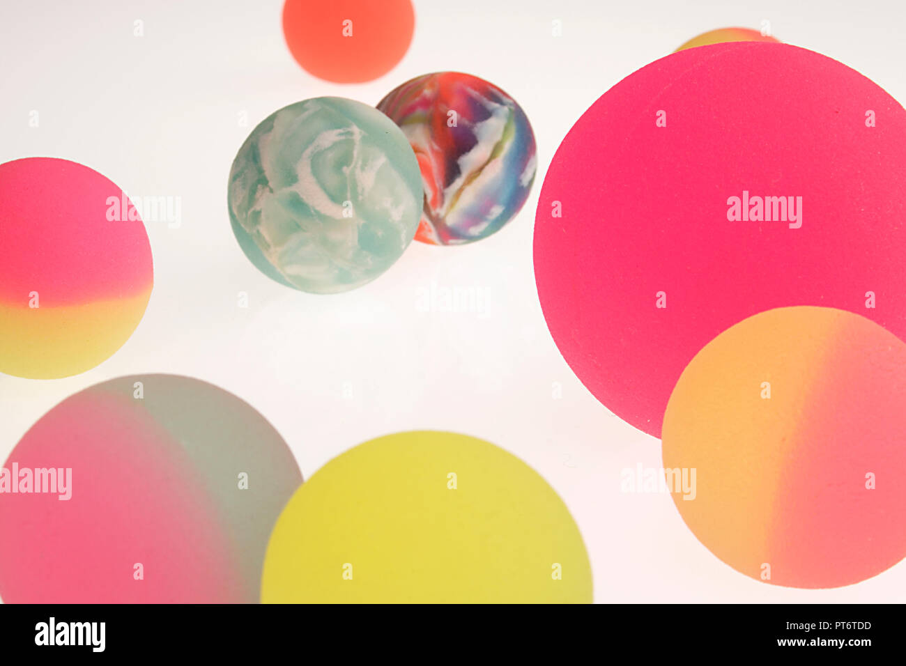 STILL LIFE OF ASSORTED BALLS OF ON A PLAIN BACKLIT BACKGROUND Stock ...