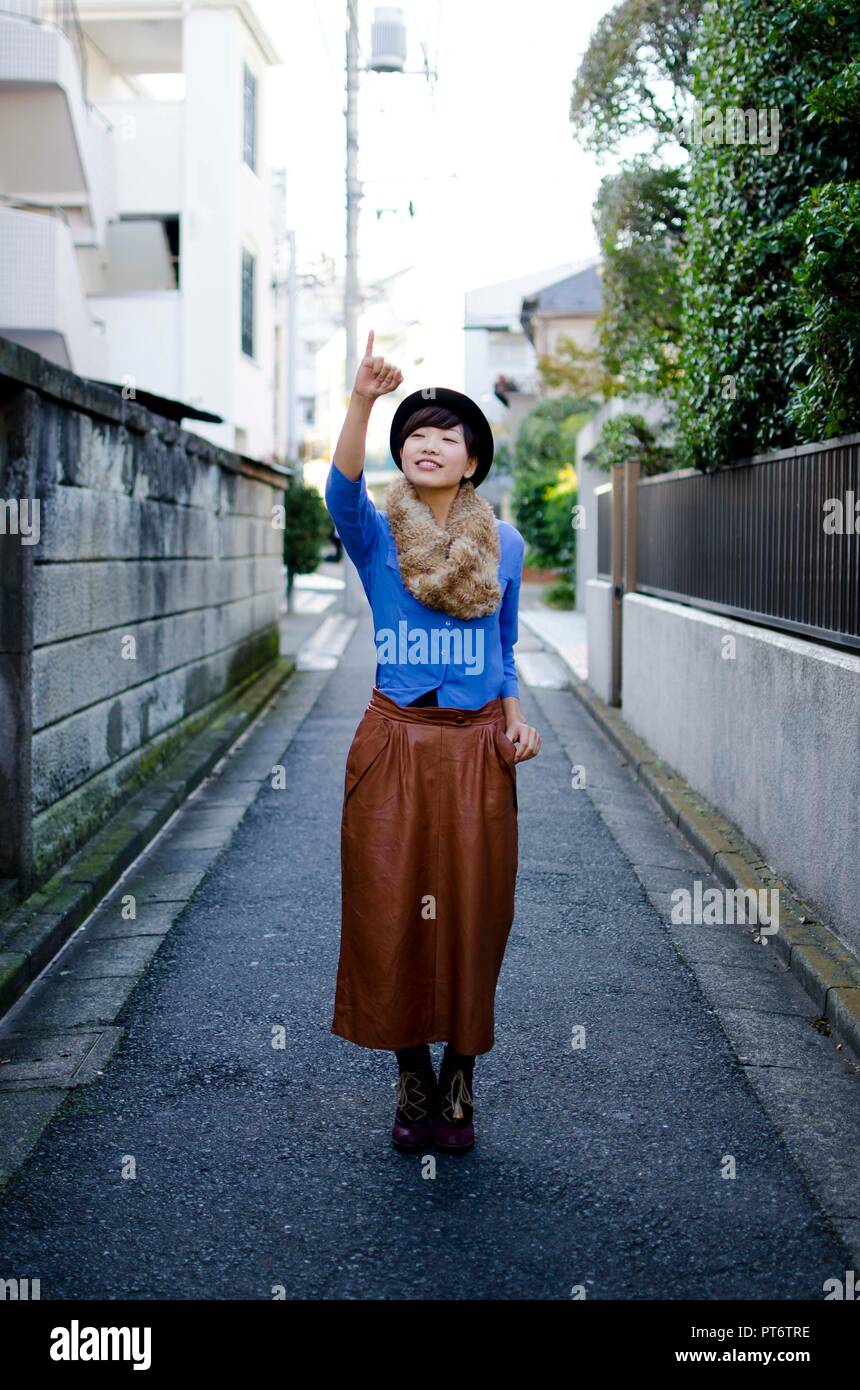 Japanese Girl poses on the street in Shimo-Kitazawa, Japan. Shimo ...
