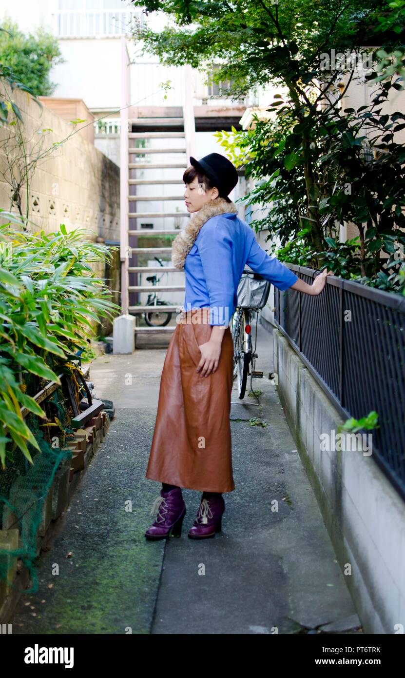 Japanese Girl poses on the street in Shimo-Kitazawa, Japan. Shimo ...