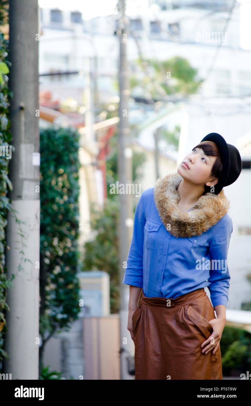 Japanese Girl poses on the street in Shimo-Kitazawa, Japan. Shimo ...