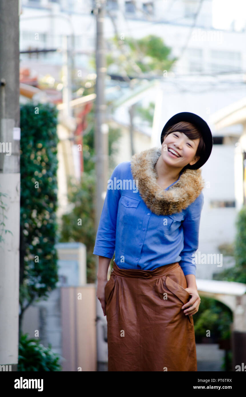Japanese Girl poses on the street in Shimo-Kitazawa, Japan. Shimo ...