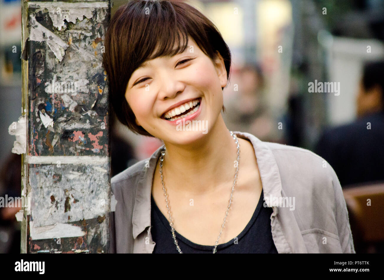 Japanese Girl poses on the street in Shimo-Kitazawa, Japan. Shimo ...